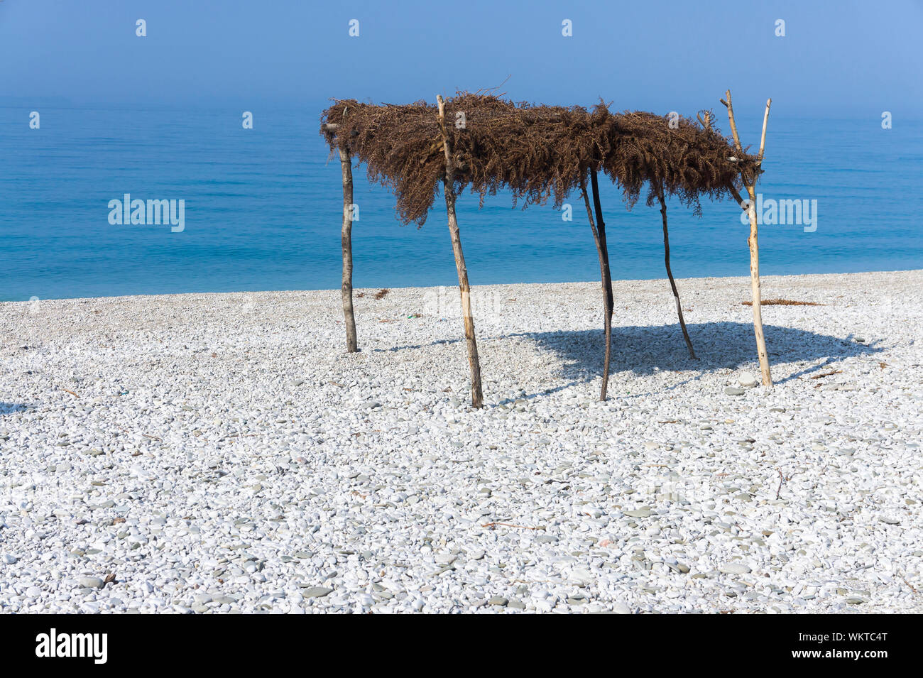 Straw canopy on the beach. Borsh Albania Stock Photo - Alamy