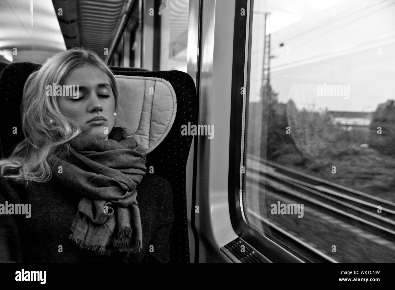 Sleeping train commuter hi-res stock photography and images - Alamy