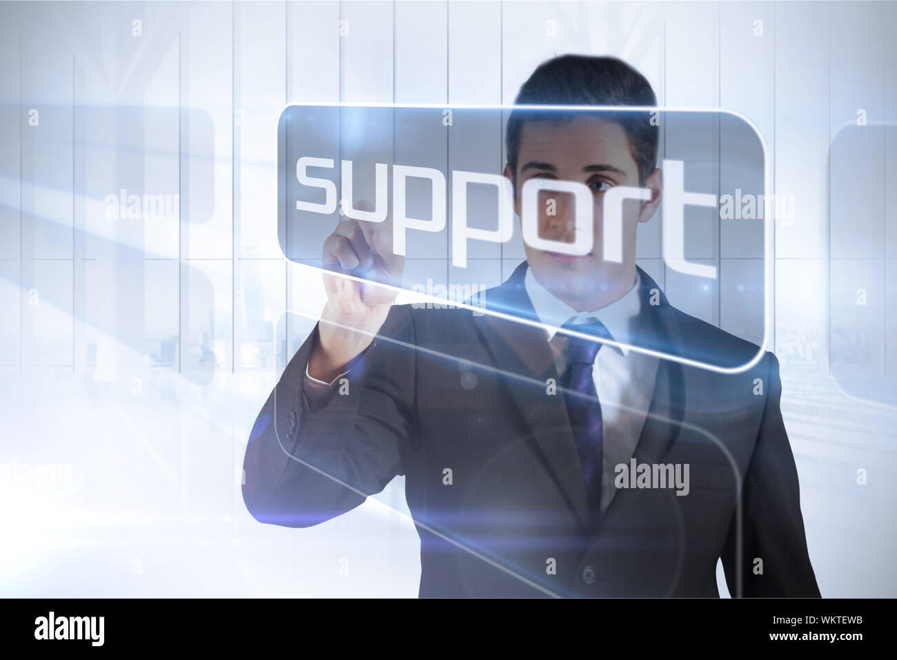 Businessman presenting the word support against white room with large ...