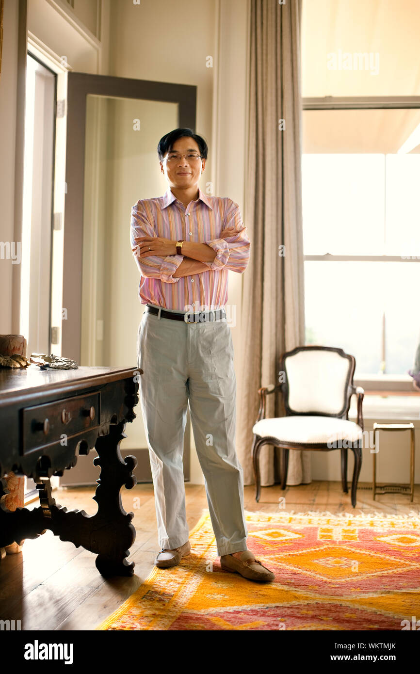 Portrait of a happy mid adult man Stock Photo - Alamy