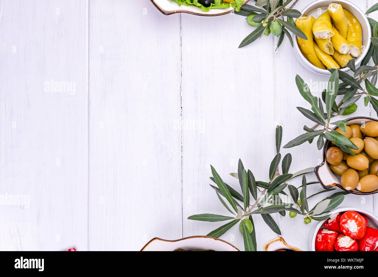 Traditional appetizers, green and red olives from Greek cuisine. Fresh ...