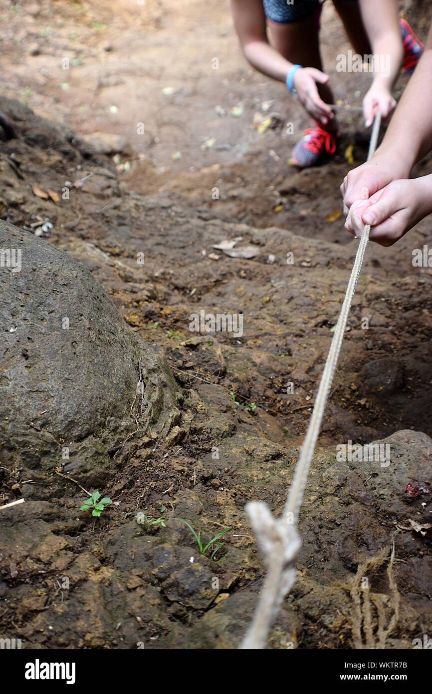 Person pulling rope hi-res stock photography and images - Alamy