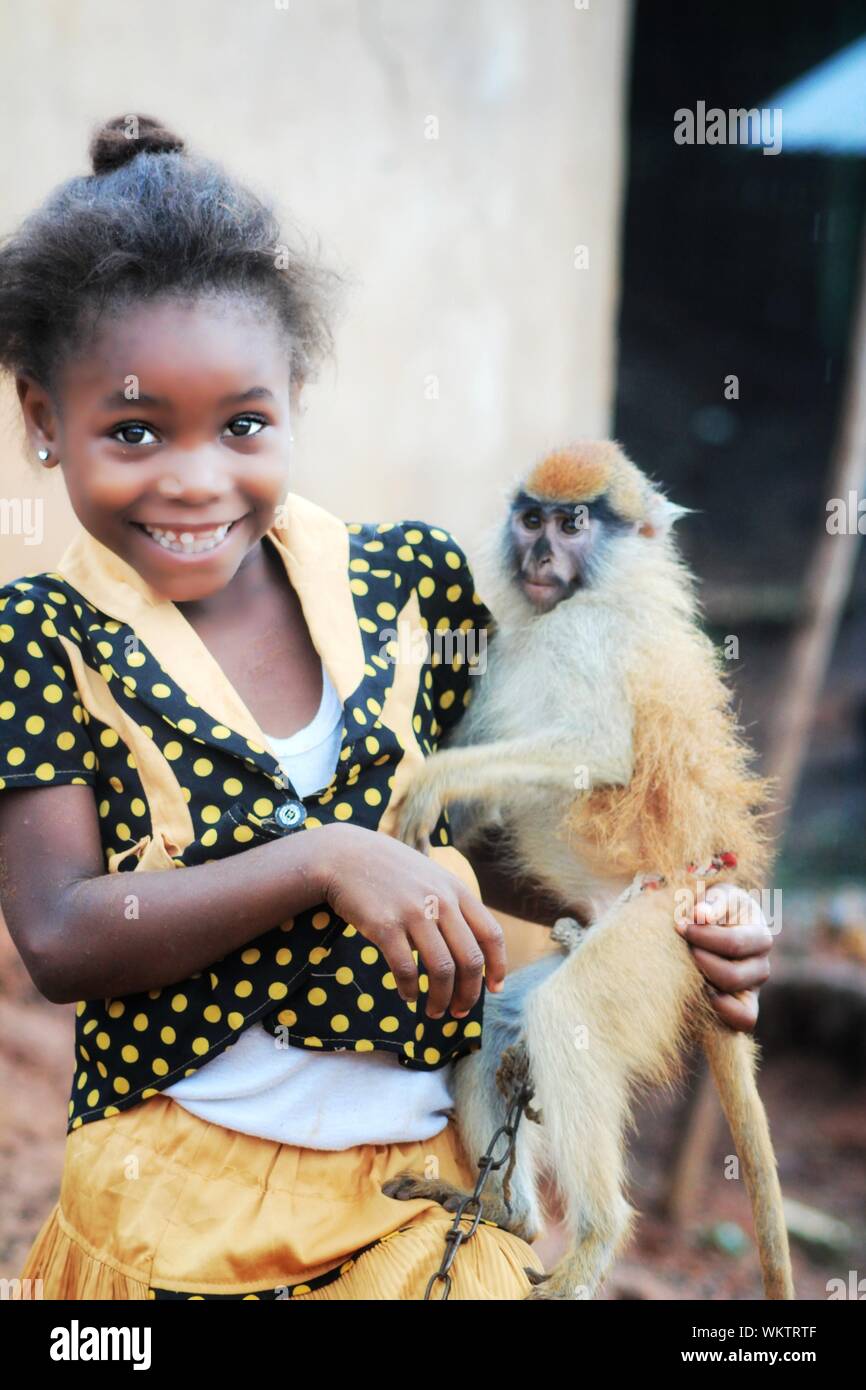 Close up girl holding monkey hi-res stock photography and images - Alamy