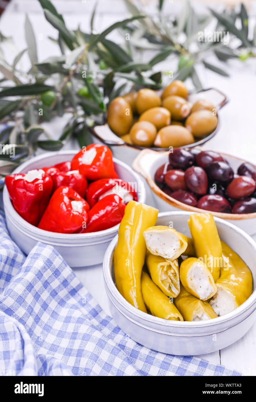 Traditional appetizers, green and red olives from Greek cuisine. Fresh ...