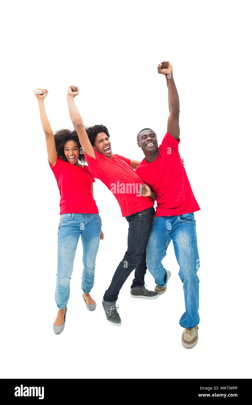 Excited football fans in red cheering on white background Stock Photo ...