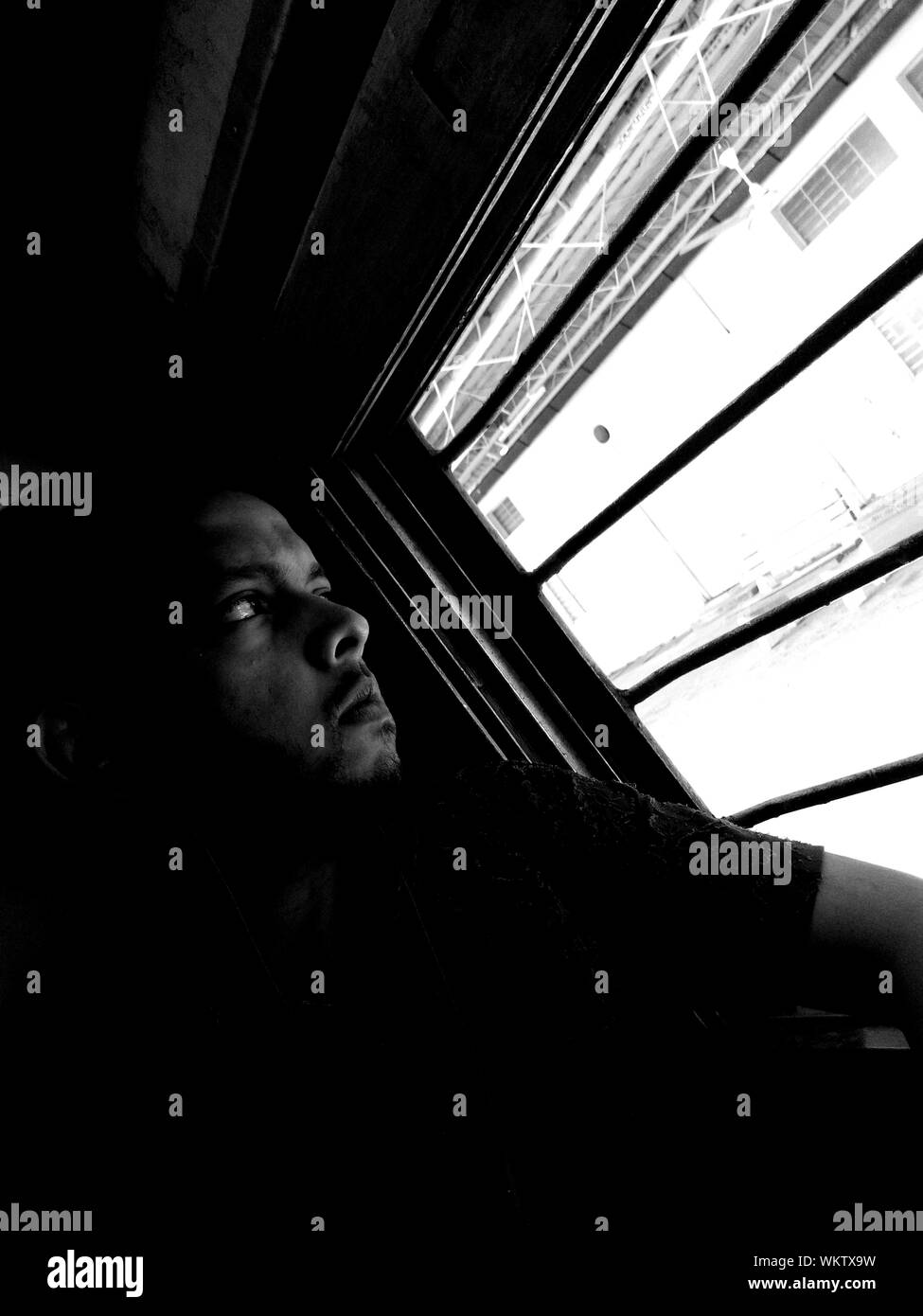 Man Looking Through Train Window Black and White Stock Photos & Images ...