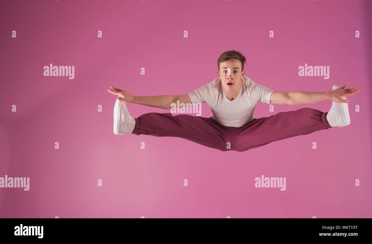 Cool break dancer mid air doing the splits in the dance studio Stock ...