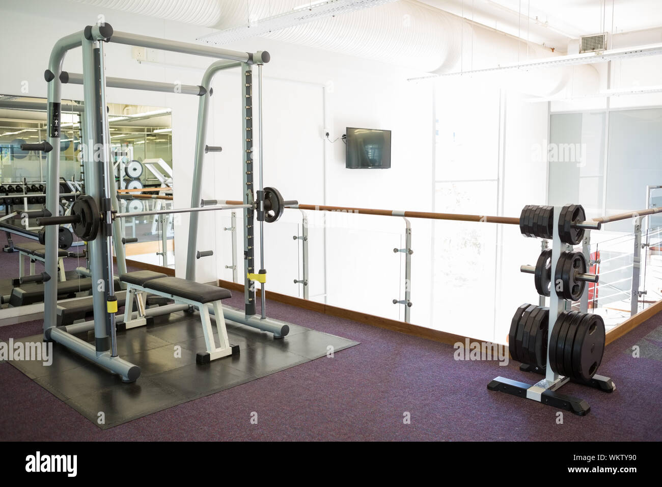 Empty weights room with bench press at the leisure center Stock Photo ...
