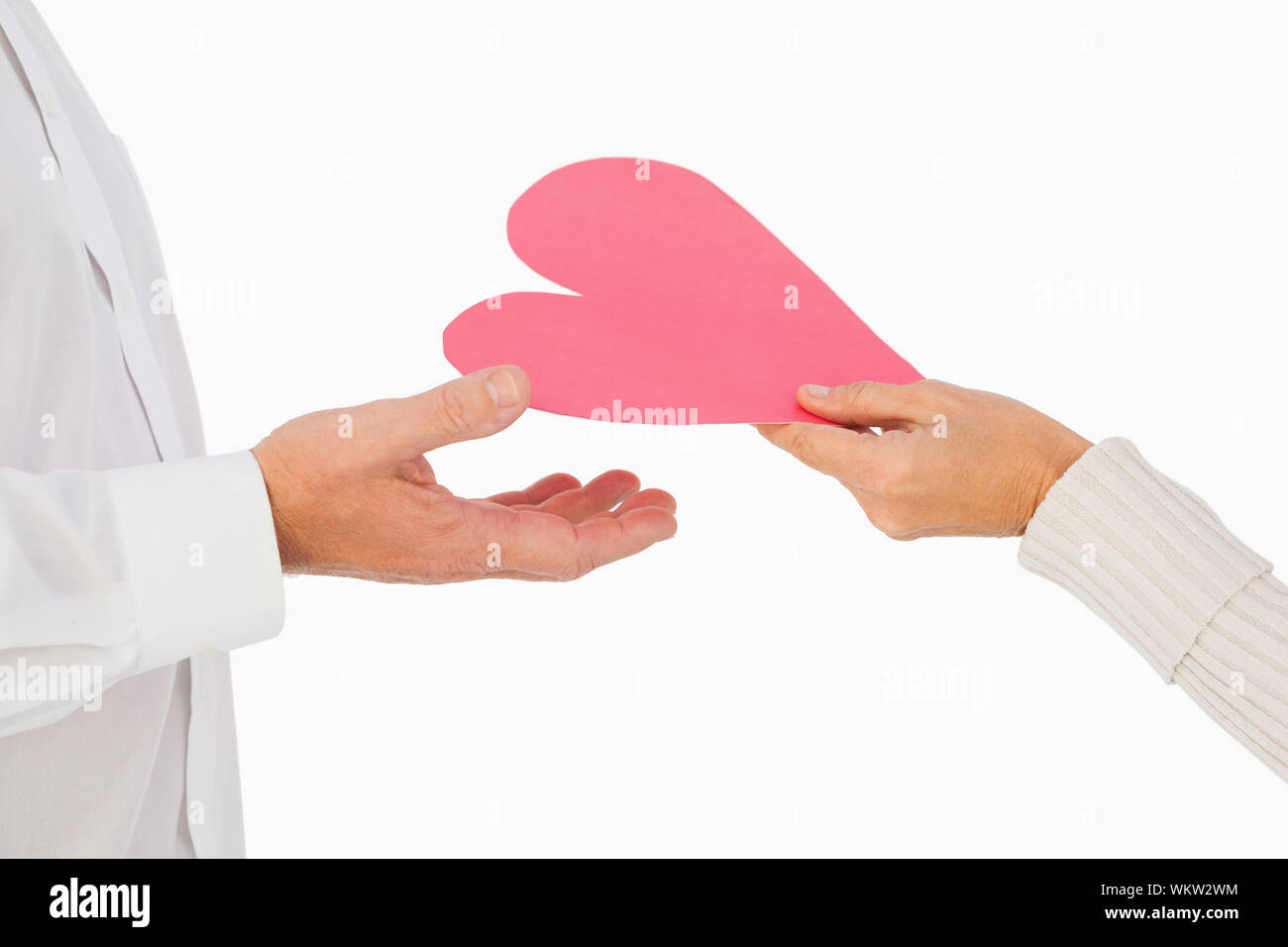 Man handing a paper to a woman hi-res stock photography and images - Alamy