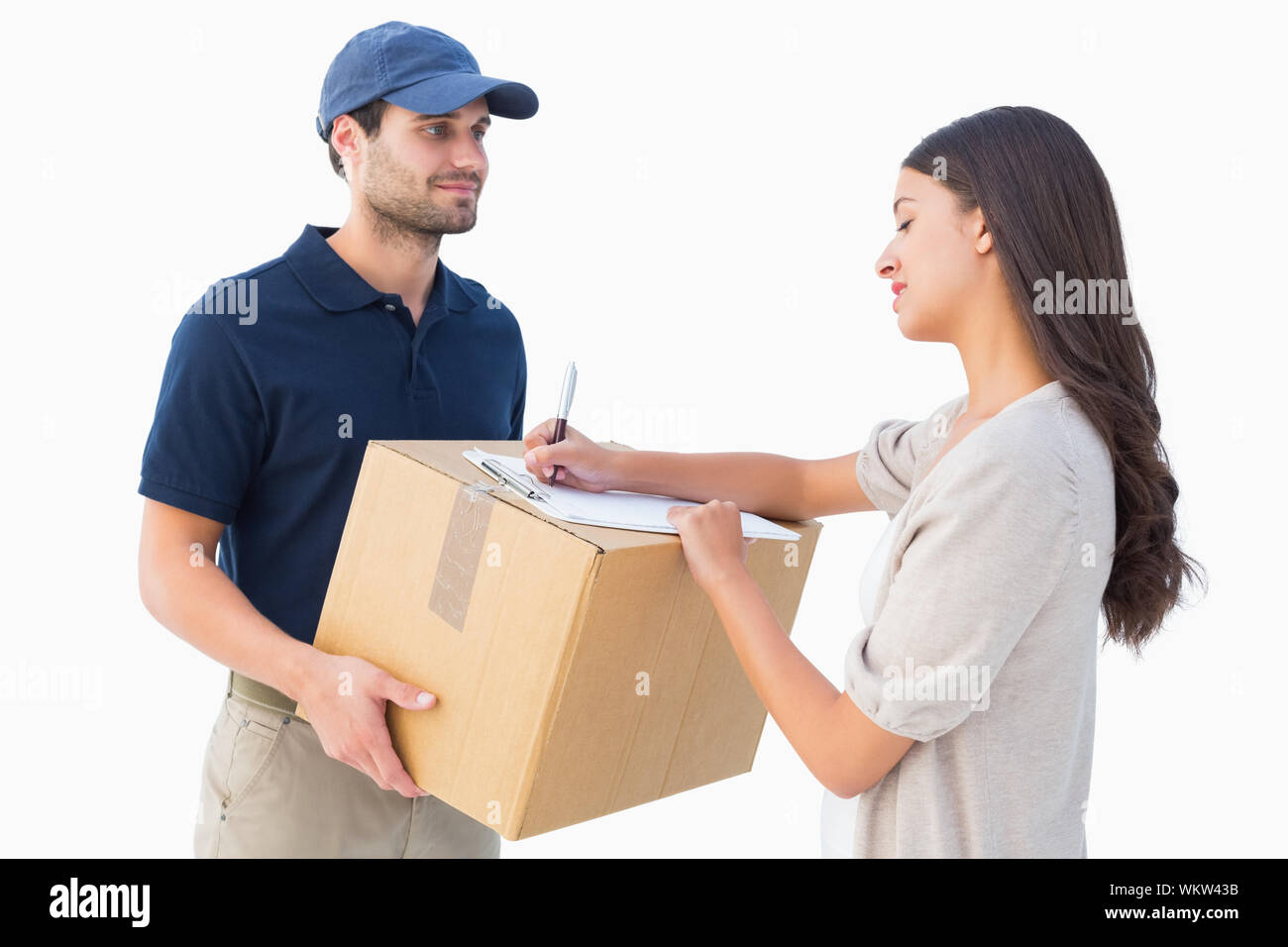 Happy delivery man with customer on white background Stock Photo - Alamy
