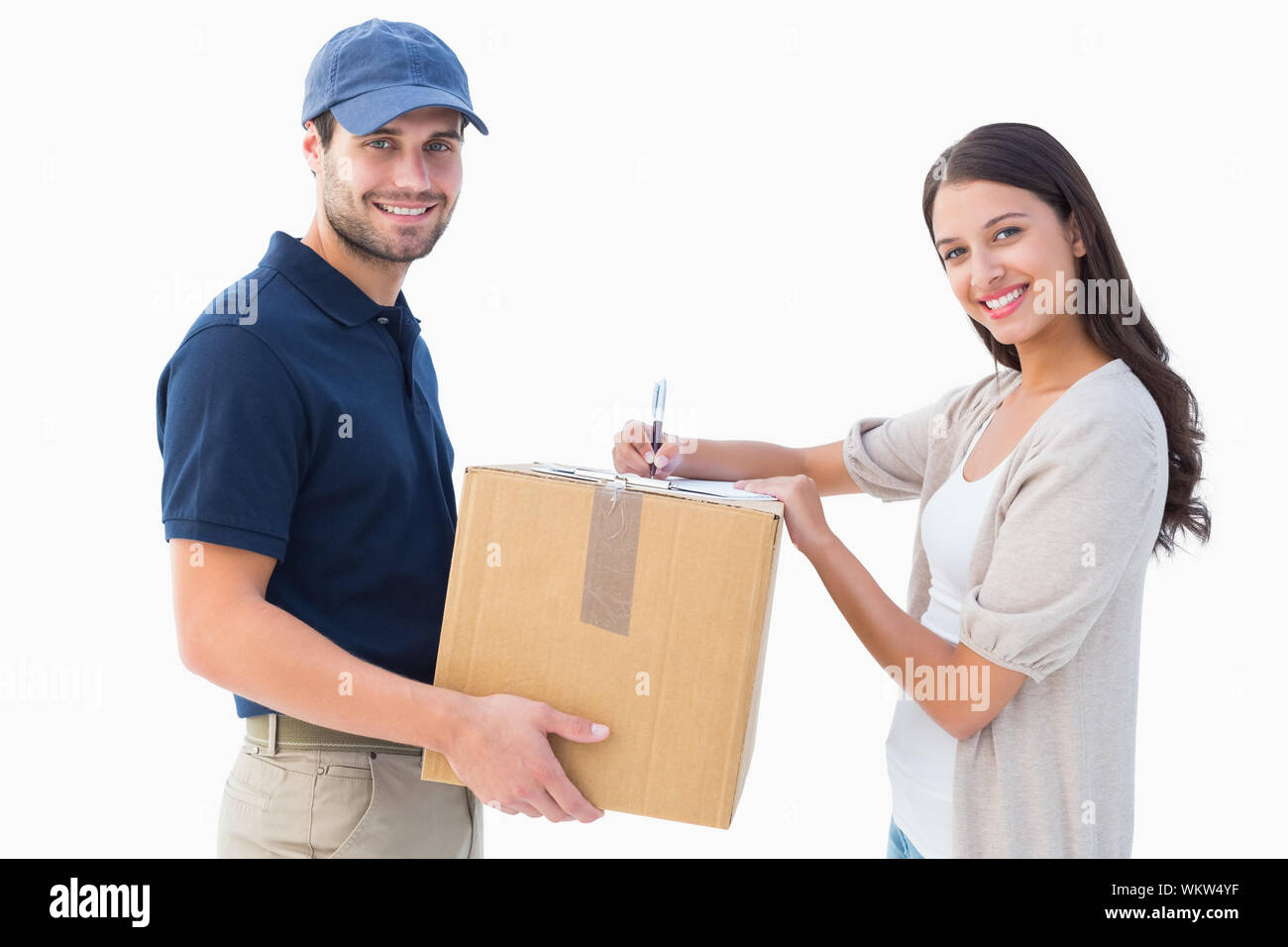 Happy delivery man with customer on white background Stock Photo - Alamy