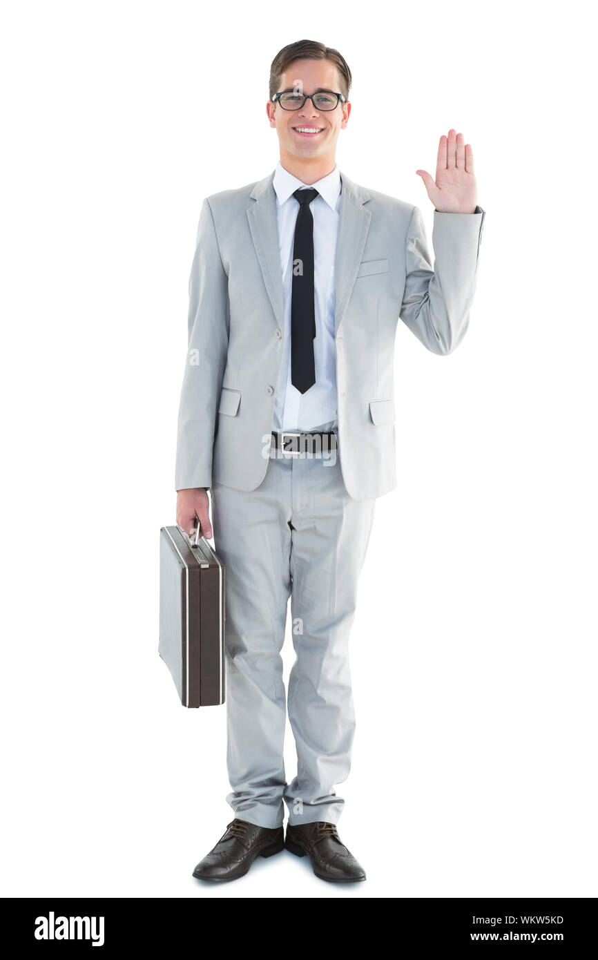 Handsome businessman waving at camera on white background Stock Photo ...