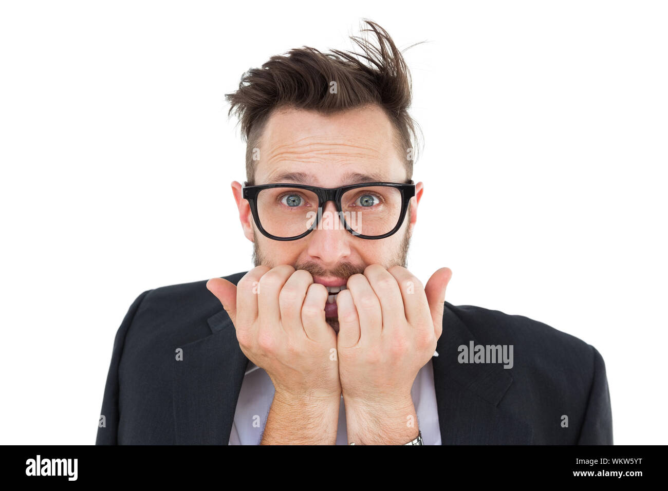 Geeky nervous businessman looking at camera on white background Stock ...