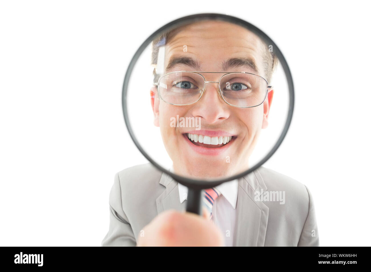 Businessman looking through magnifying glass hi-res stock photography ...