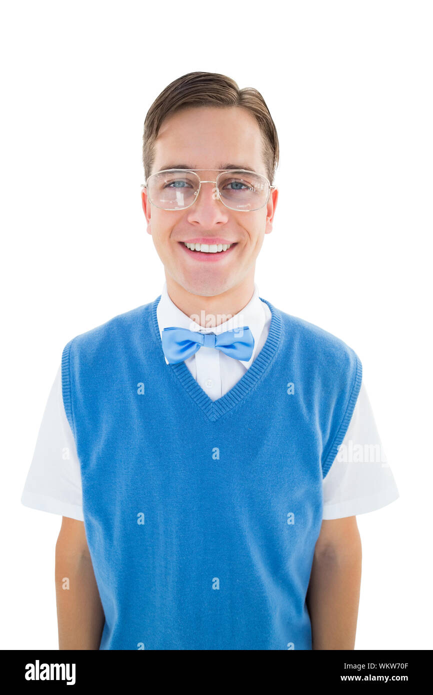 Geeky young hipster smiling at camera on white background Stock Photo ...