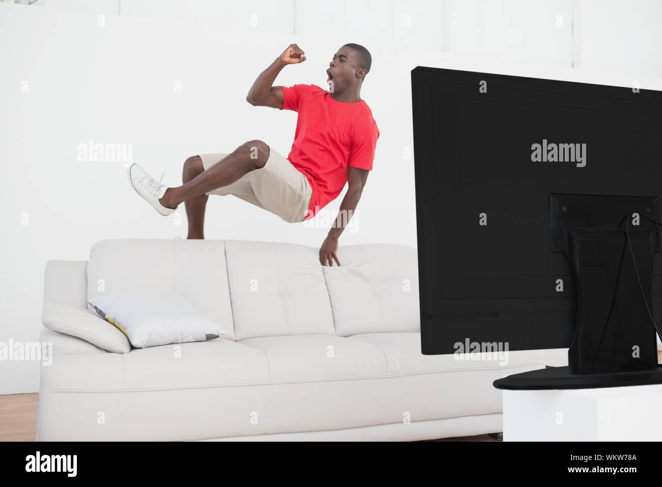 Soccer tv jumping hi-res stock photography and images - Alamy