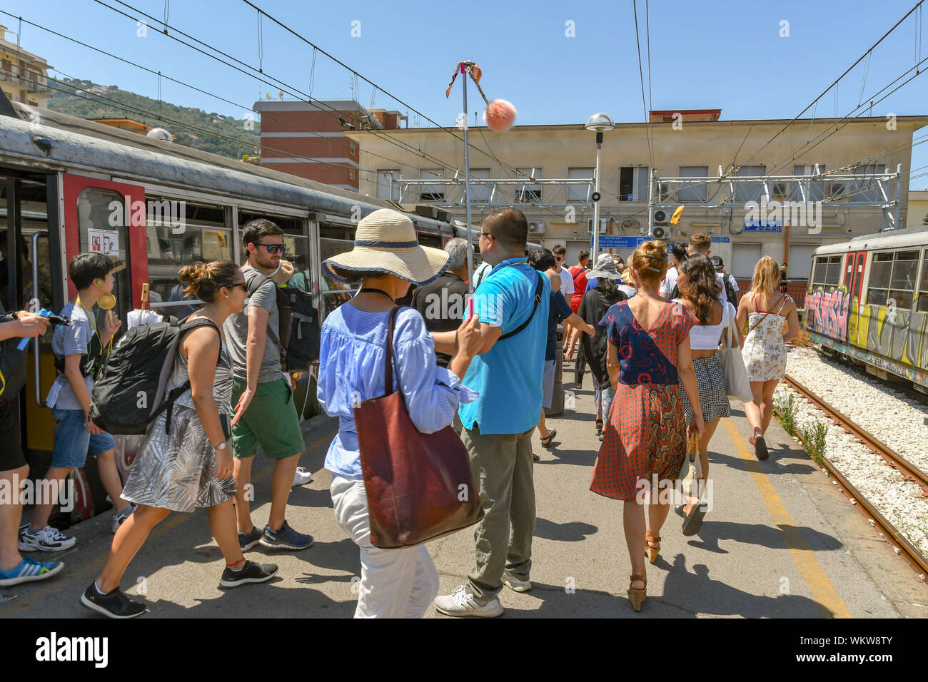 SORRENTO, ITALY - AUGUST 2019: People getting off a train at Sorrento ...