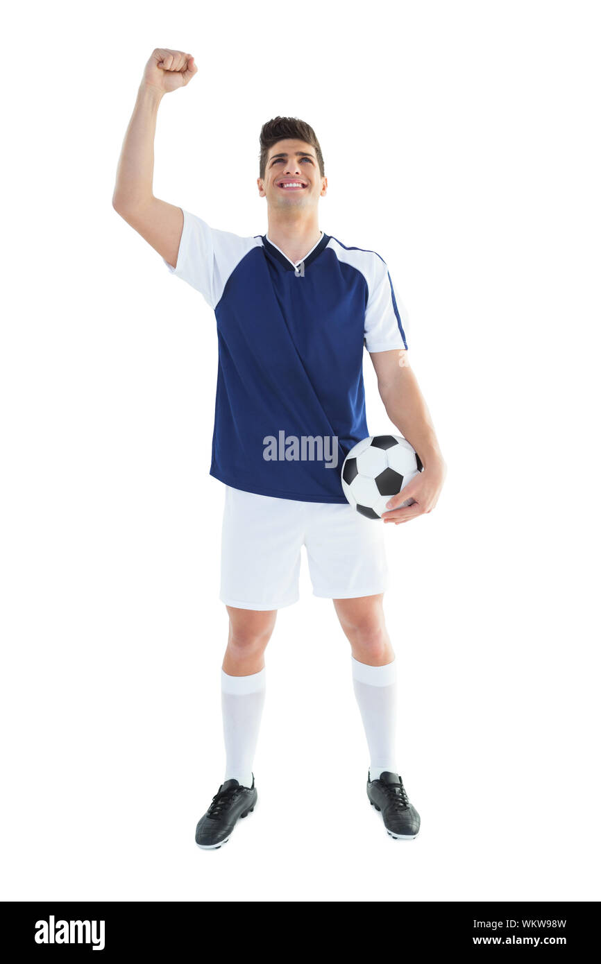 Football player in blue celebrating on white background Stock Photo - Alamy