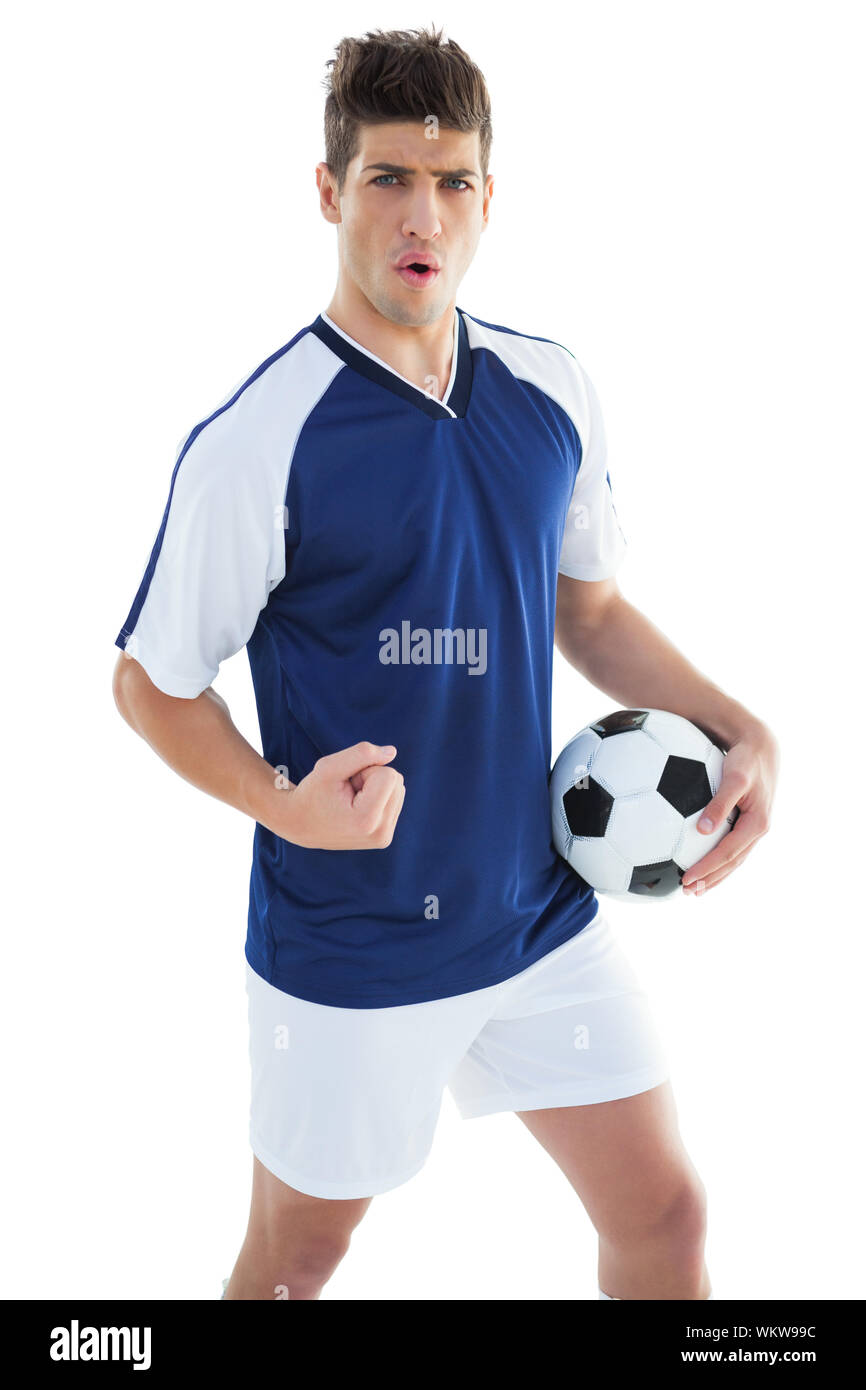 Football player in blue celebrating on white background Stock Photo - Alamy