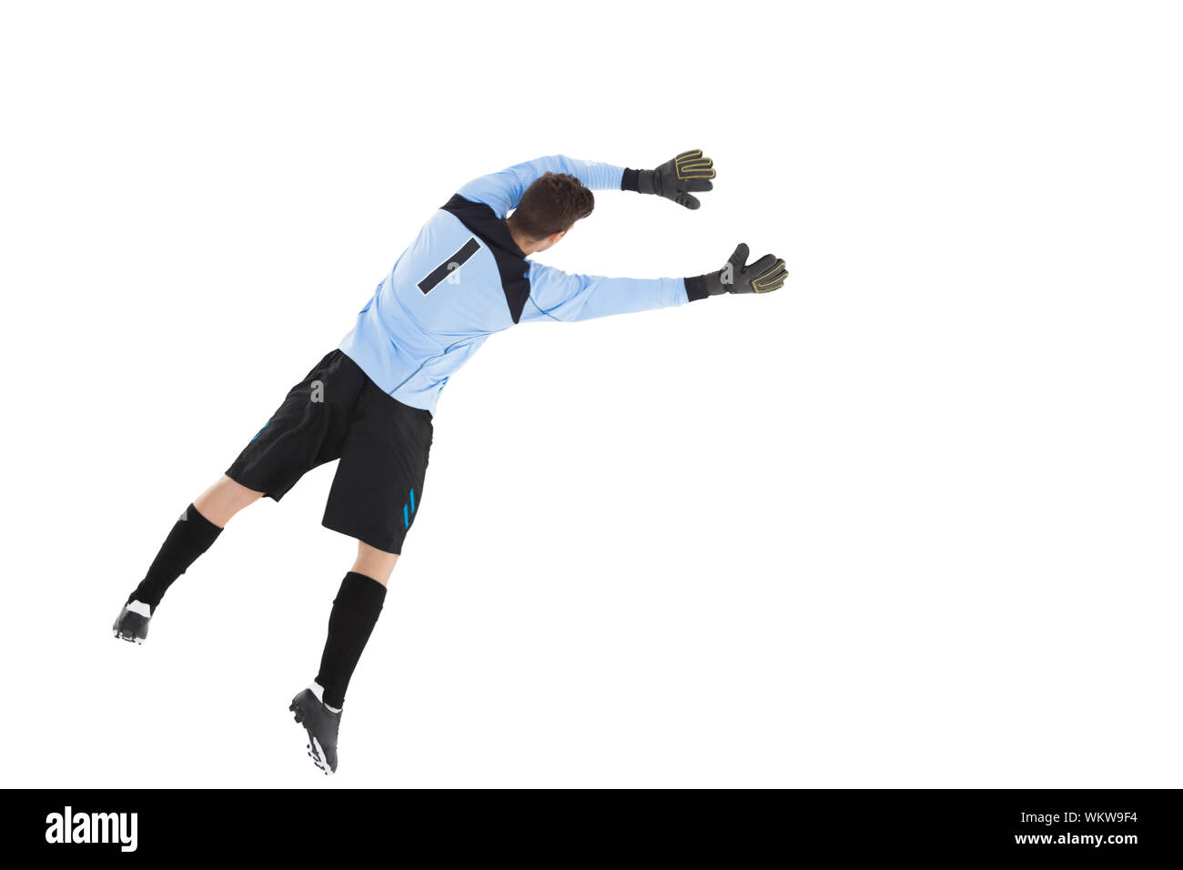 Goalkeeper in blue making a save on white background Stock Photo - Alamy