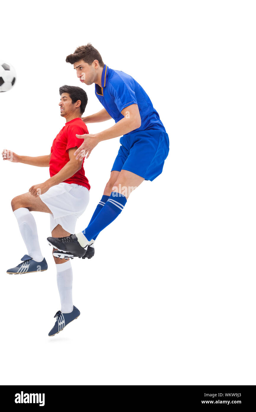Football players tackling for the ball on white background Stock Photo ...