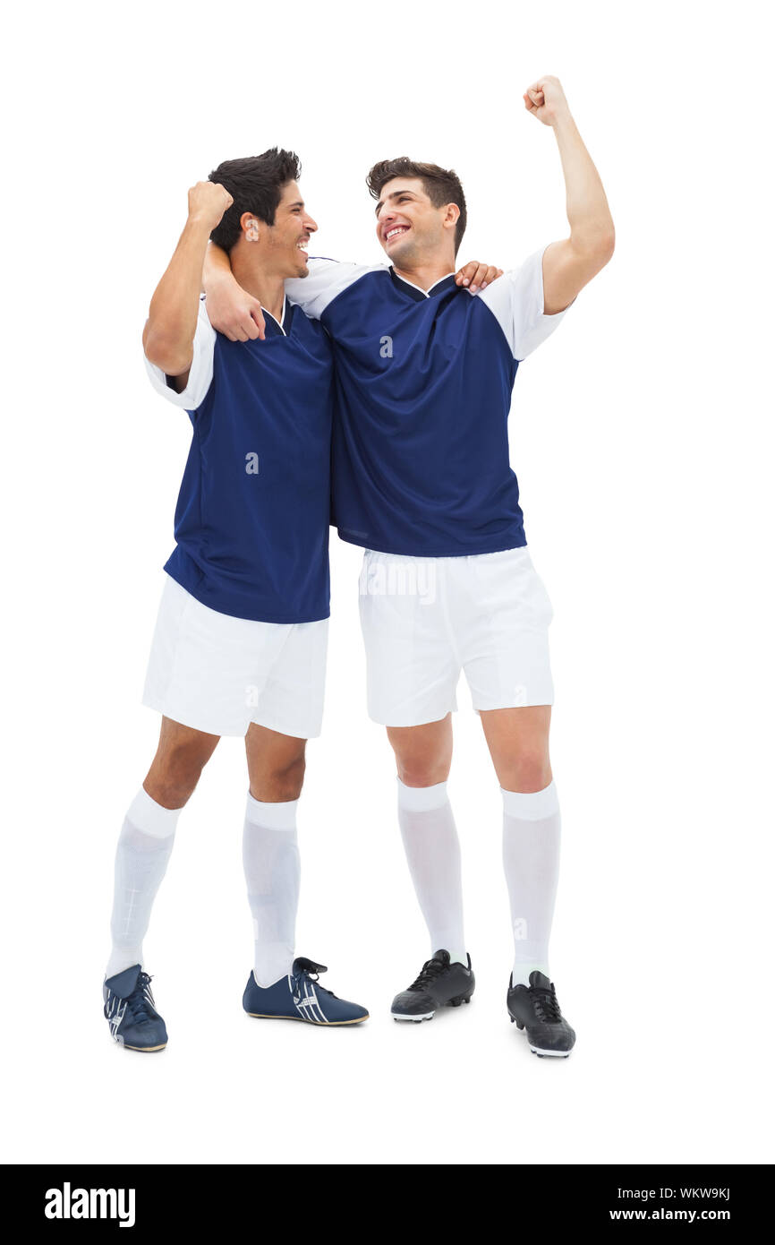 Football players celebrating a win on white background Stock Photo - Alamy