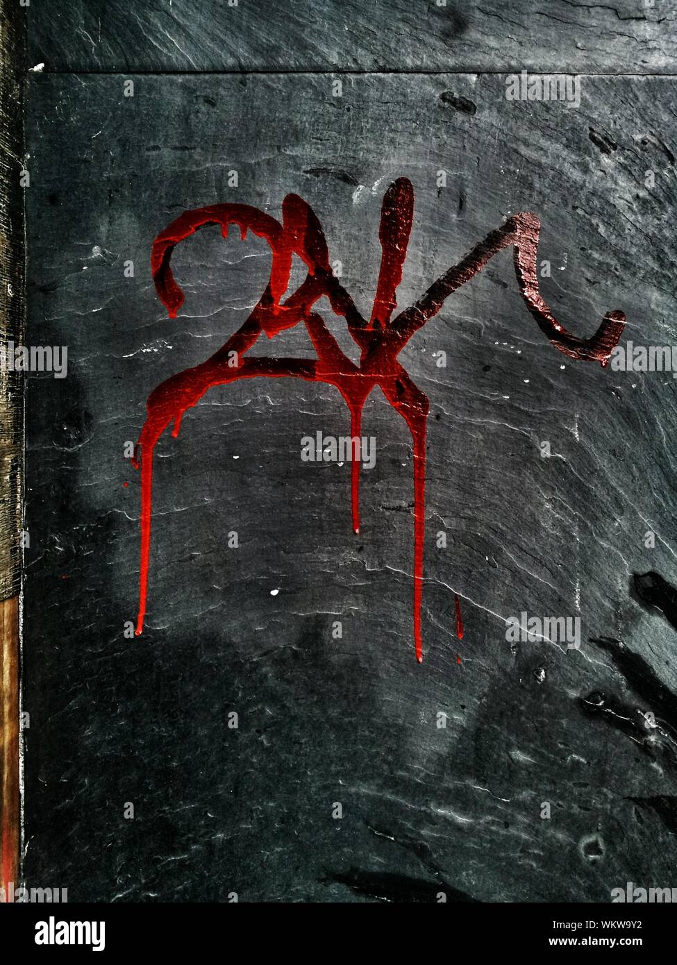 Red Graffiti On Wall Stock Photo - Alamy