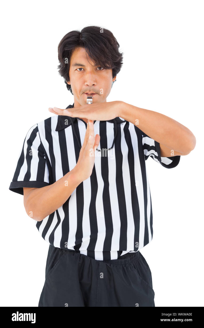 Stern referee showing time out sign on white background Stock Photo - Alamy