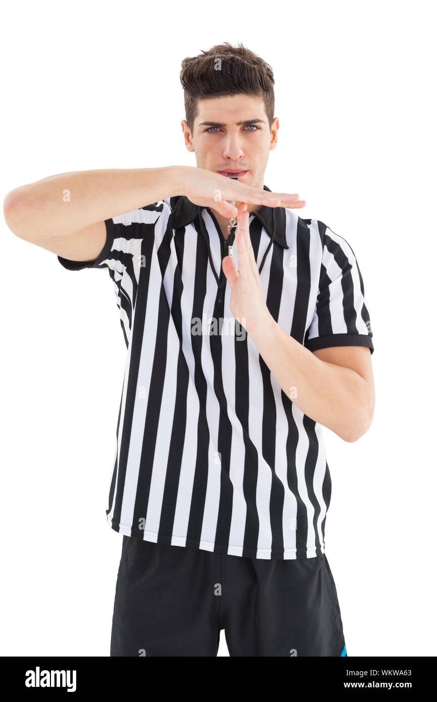 Stern referee showing time out sign on white background Stock Photo - Alamy