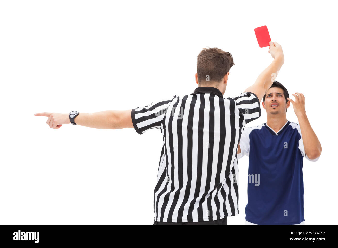 Referee sending off football player on white background Stock Photo - Alamy