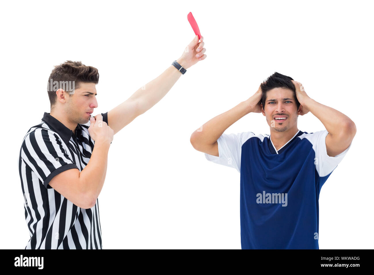 Referee sending off football player on white background Stock Photo - Alamy