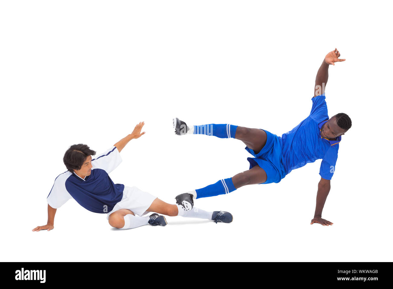 Football players tackling for the ball on white background Stock Photo ...