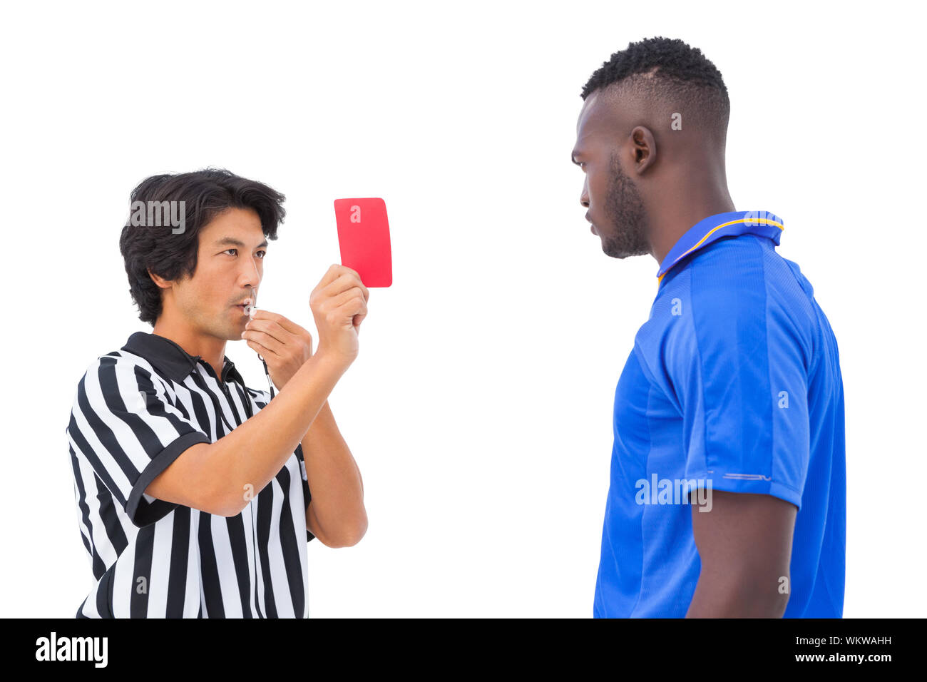 Referee sending off football player on white background Stock Photo - Alamy