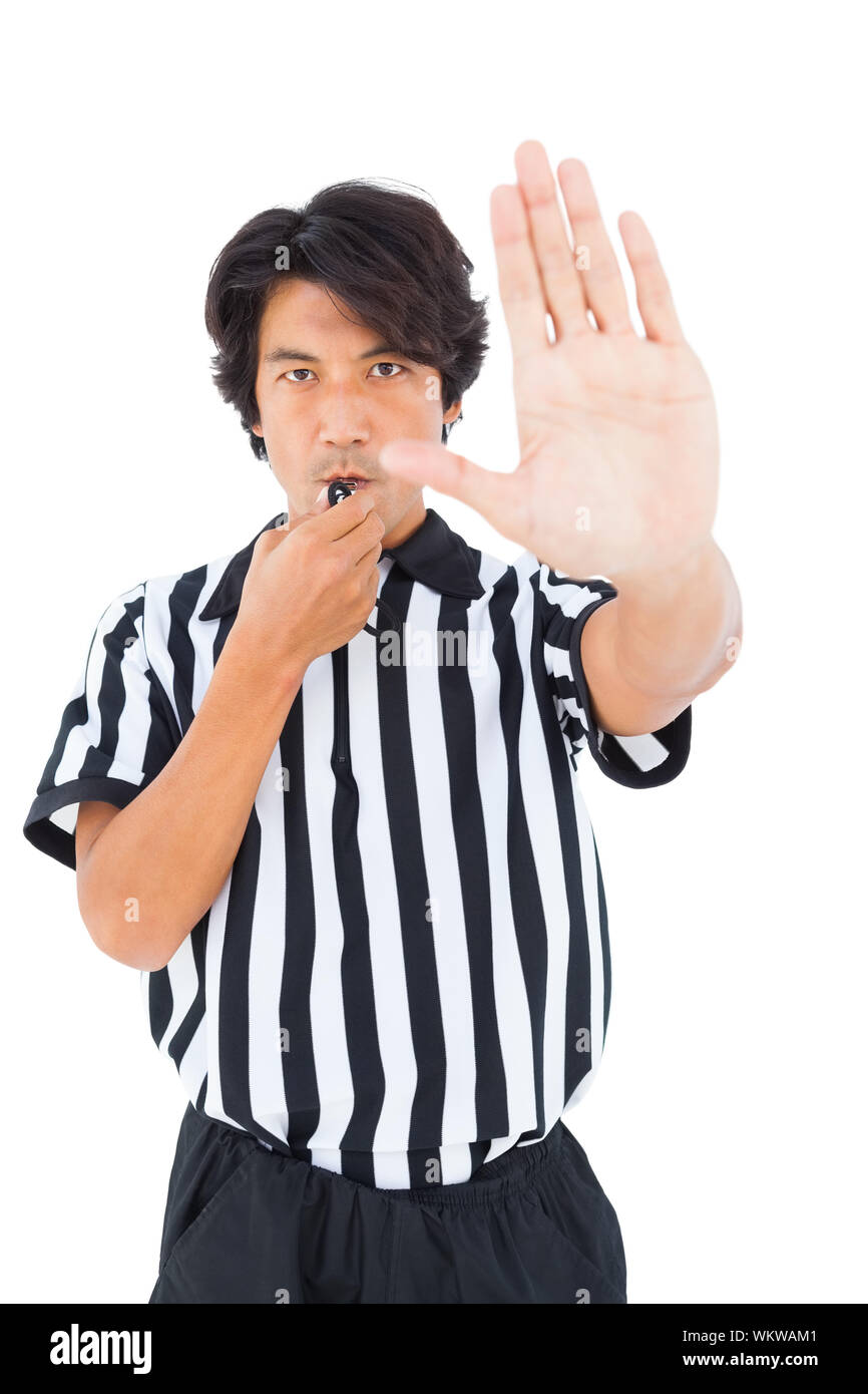 Stern referee showing stop sign with hand on white background Stock ...