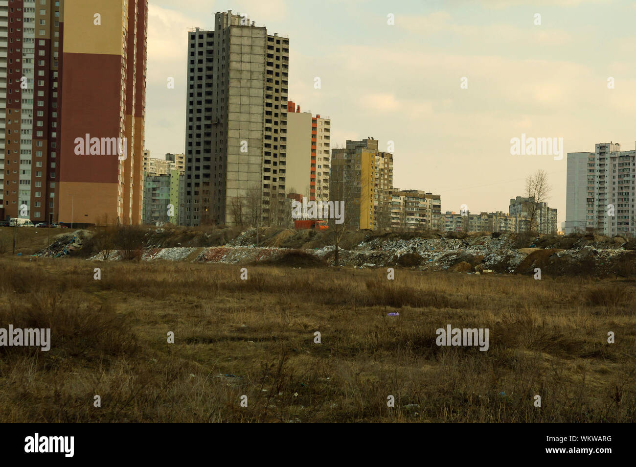 garbage dump on the background of urban high houses Stock Photo - Alamy
