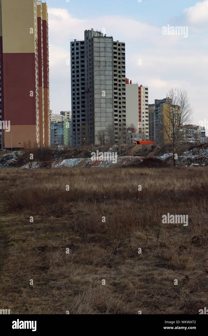 garbage dump on the background of urban high houses Stock Photo - Alamy