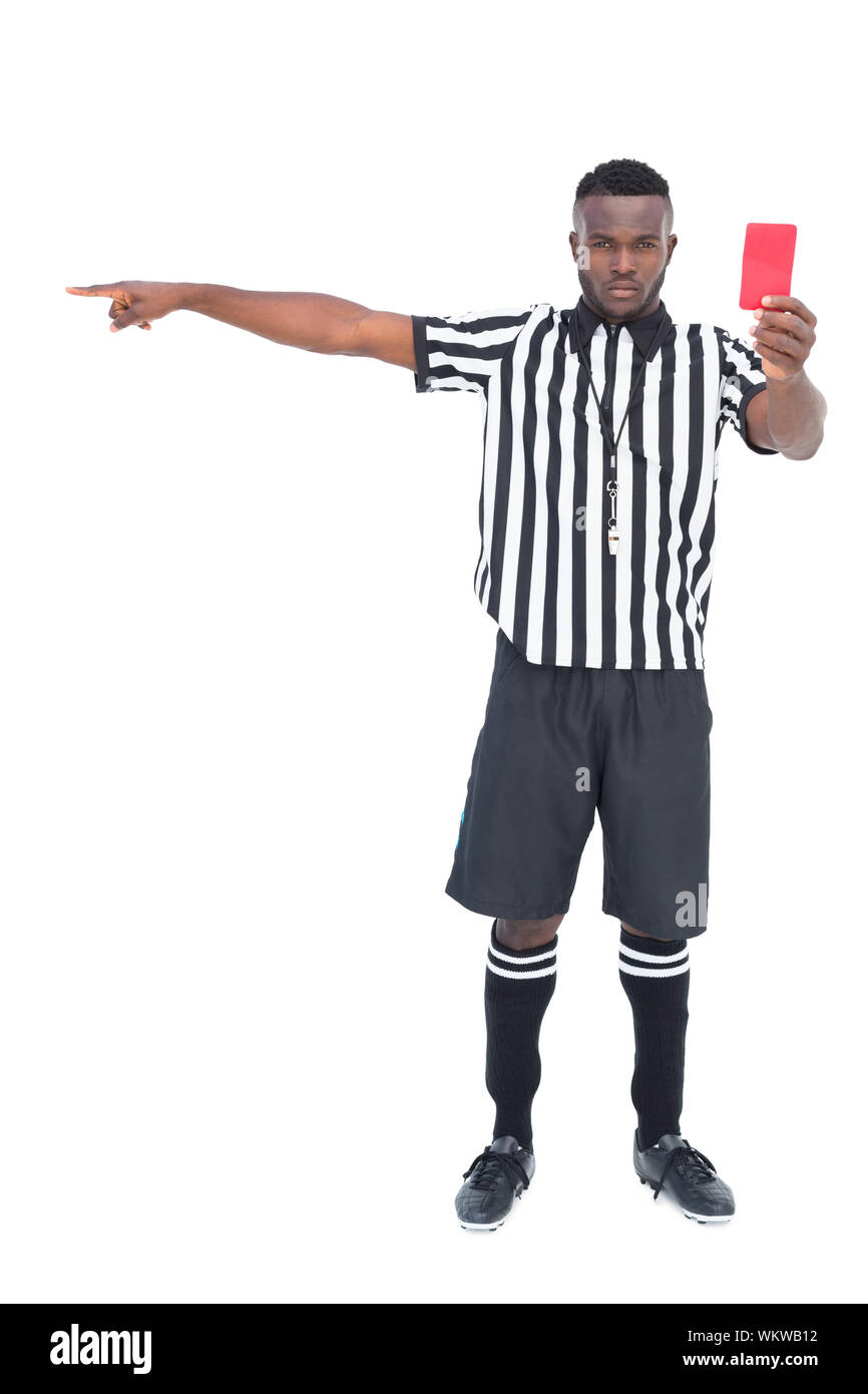 Serious referee showing red card on white background Stock Photo - Alamy
