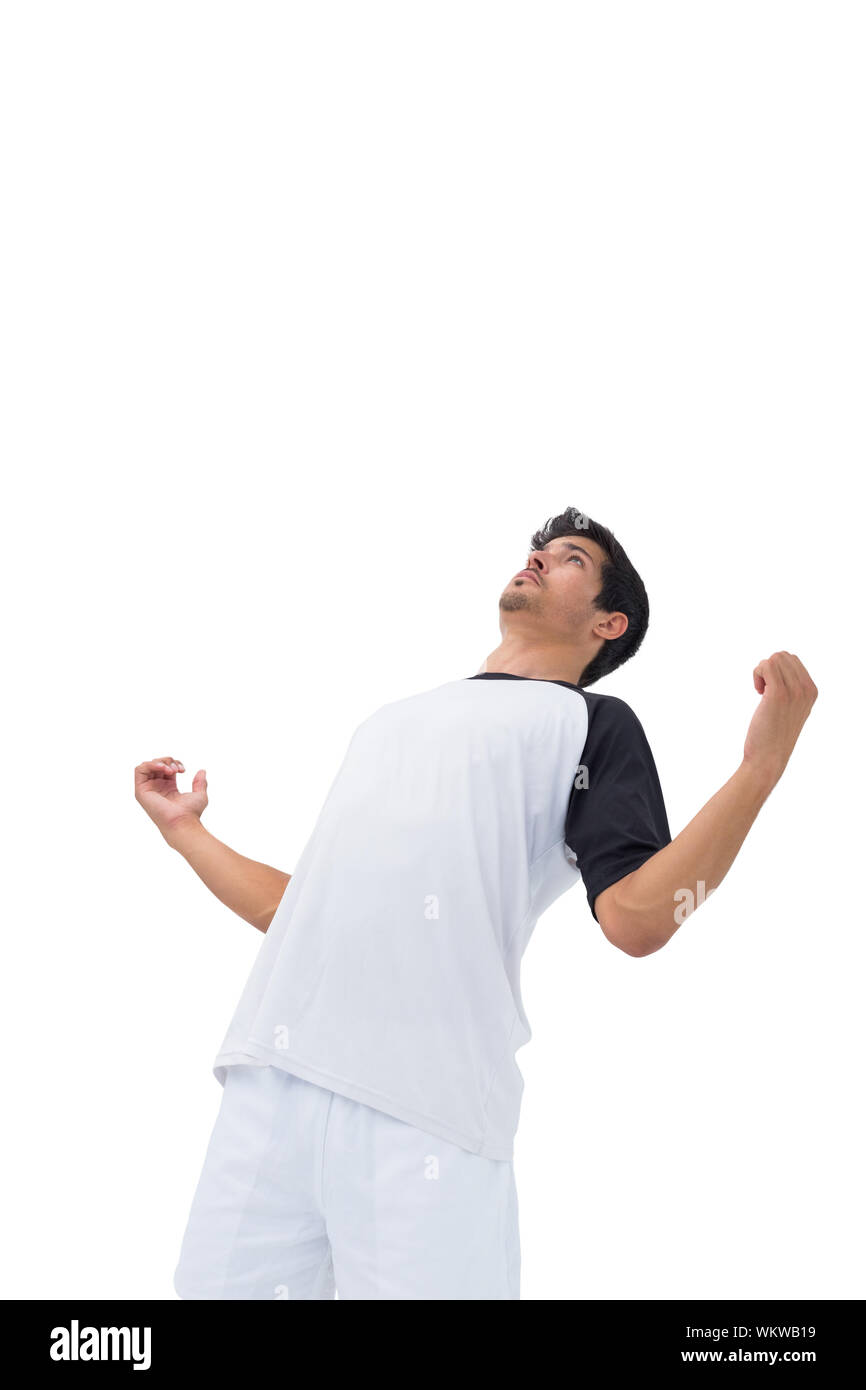 Football player in white playing on white background Stock Photo - Alamy