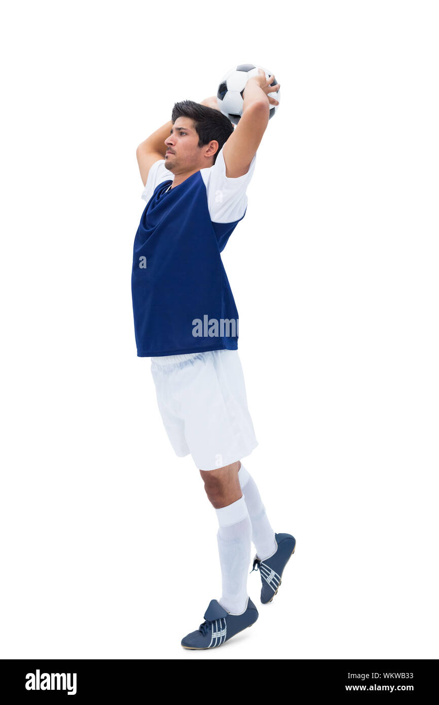 Football player in white throwing ball on white background Stock Photo ...