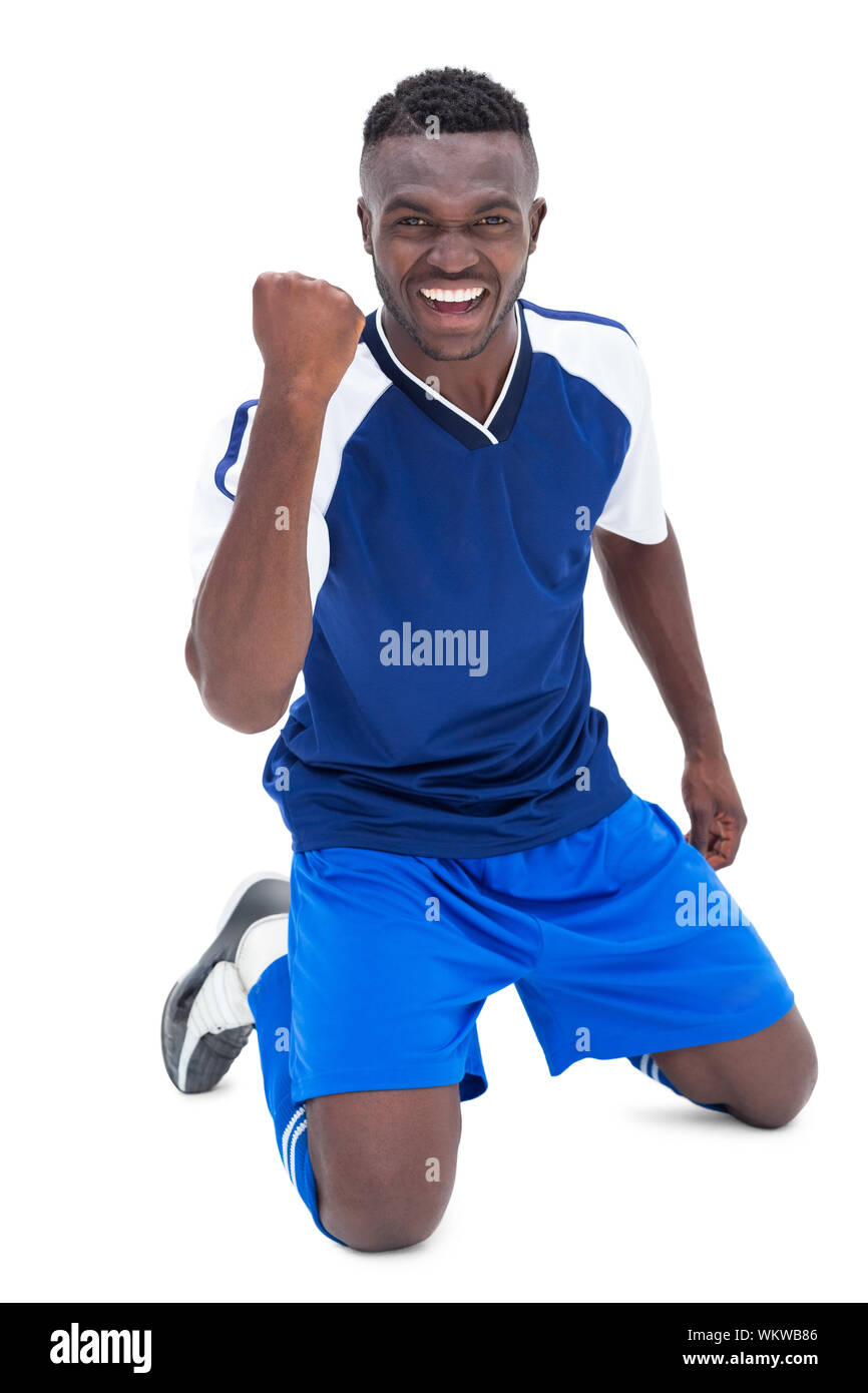 Football player in blue celebrating a win on white background Stock ...