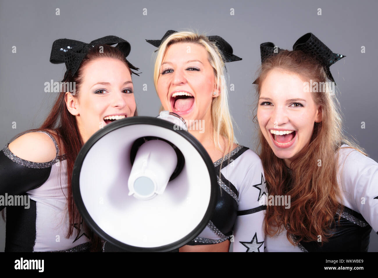 Cheerleader megaphone hi-res stock photography and images - Alamy