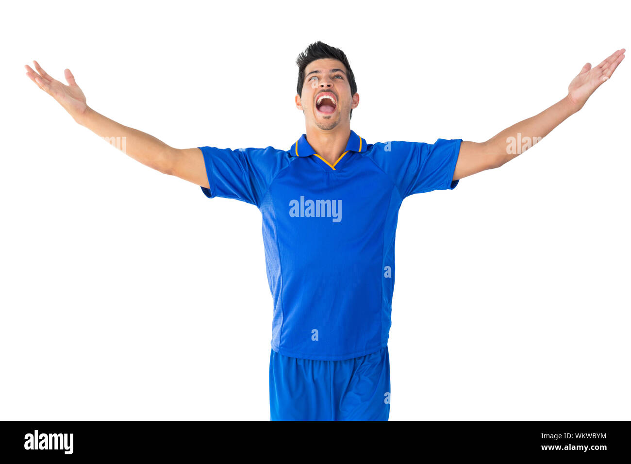 Happy football player in blue celebrating on white background Stock ...