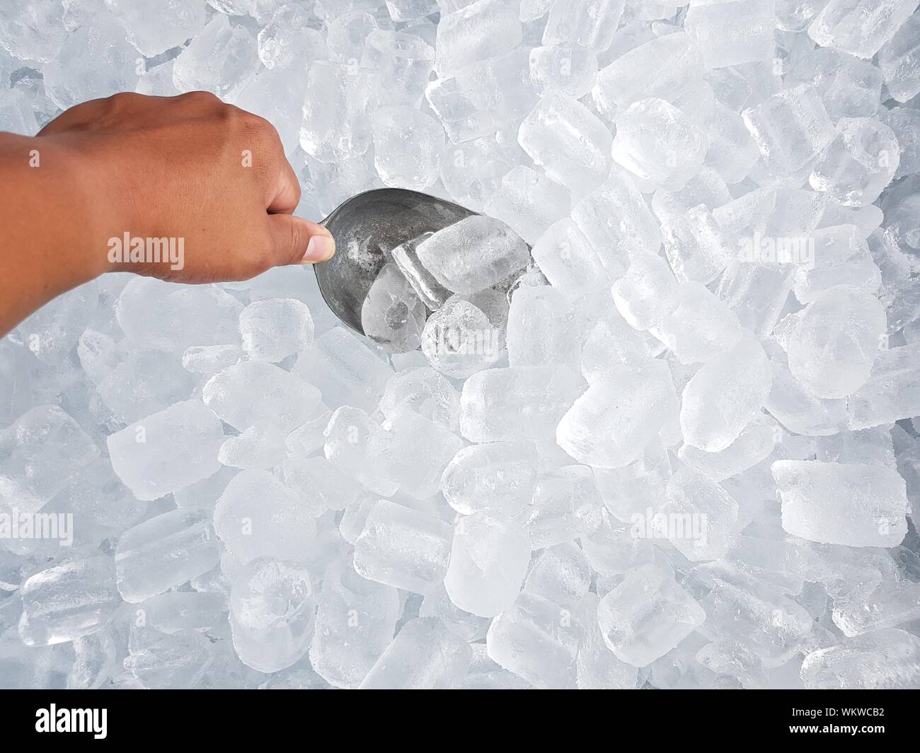 Hand scooping hi-res stock photography and images - Alamy