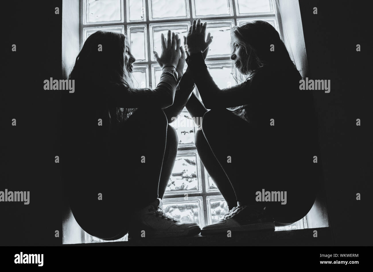 Female crouching hi-res stock photography and images - Alamy