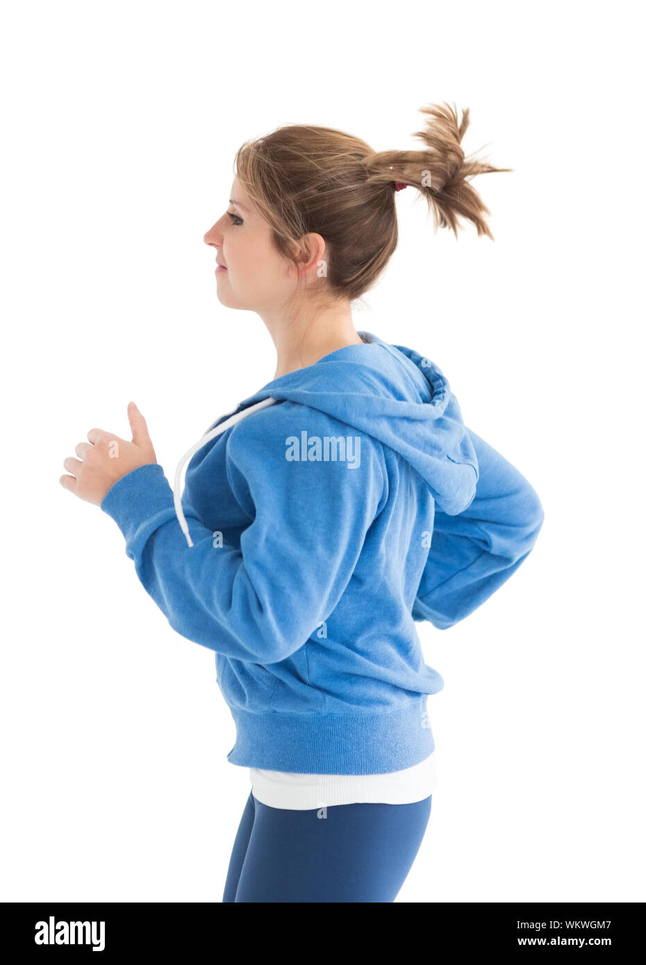 Side view of a young woman running over white background Stock Photo ...