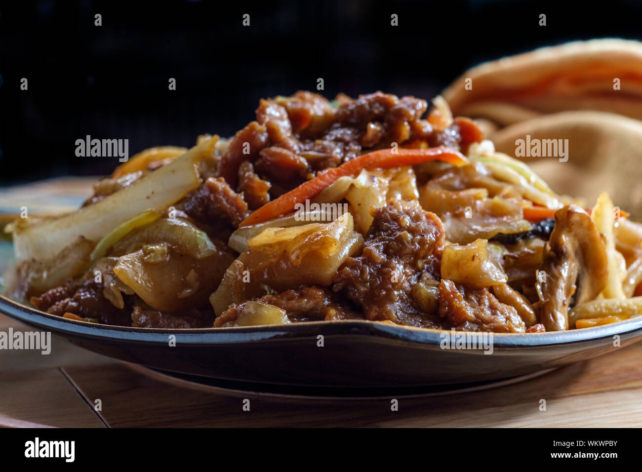 Stir fried Chinese beef chow fun with hor fun wide rice noodles cabbage ...