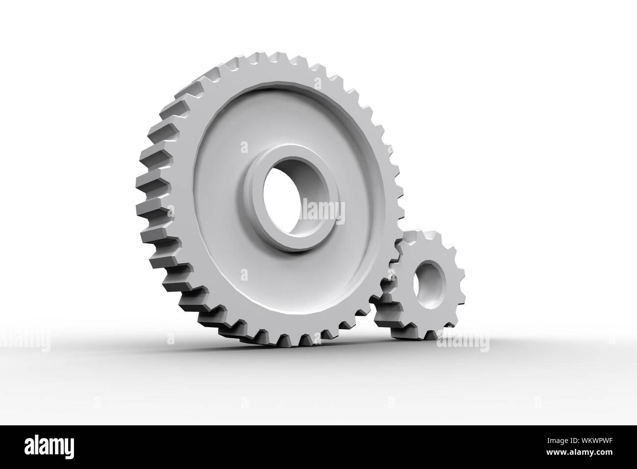 White cogs and wheels connecting on white background Stock Photo - Alamy