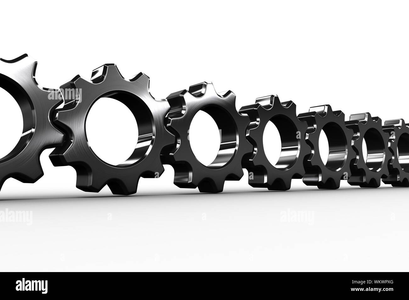 Metal cogs and wheels connecting on white background Stock Photo - Alamy