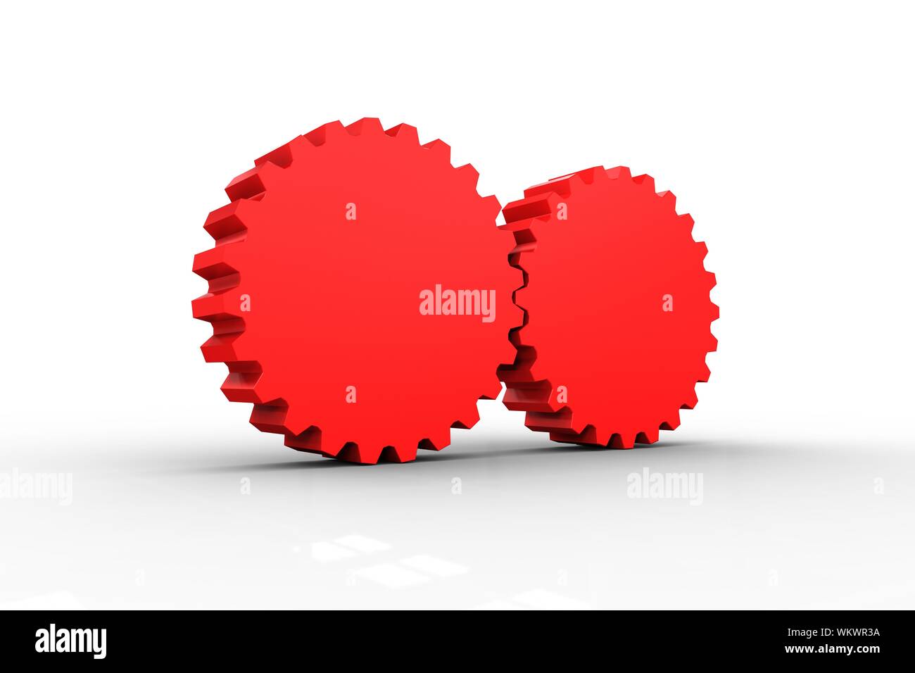 Red cog and wheel connecting on white background Stock Photo - Alamy