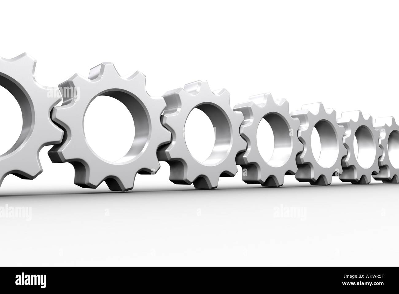 White cogs and wheels connecting on white background Stock Photo - Alamy